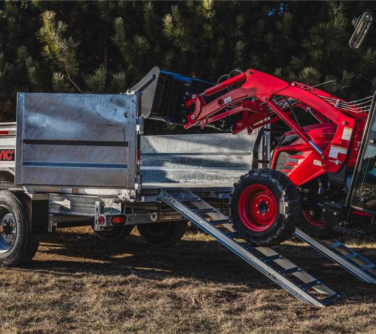 WD714 dump trailer equipped with a log loader - Metavic
